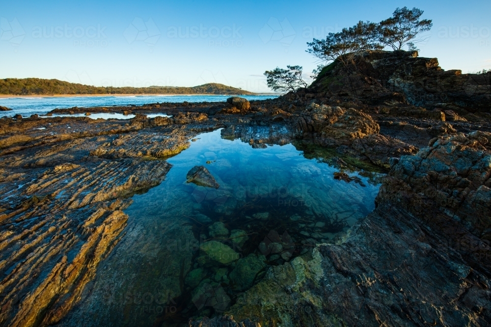 Image of Rockpool at Pebbly Beach - Austockphoto