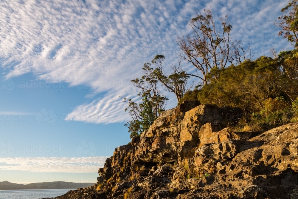 Image of rocky coastal cliffs, Bruny island, Tasmania - Austockphoto