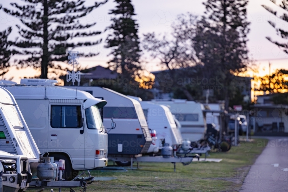 Image of Row of caravans and campers at caravan park - Austockphoto