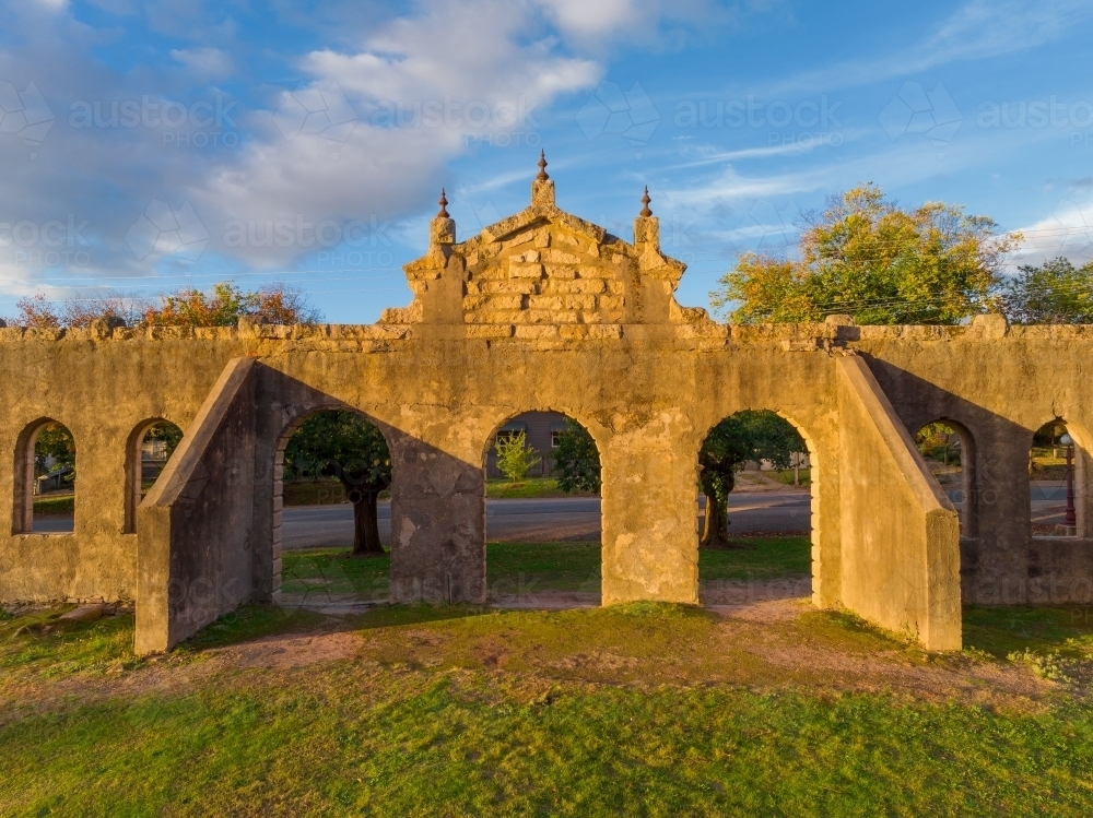 Image of Ruins of an historic building facade with arches - Austockphoto