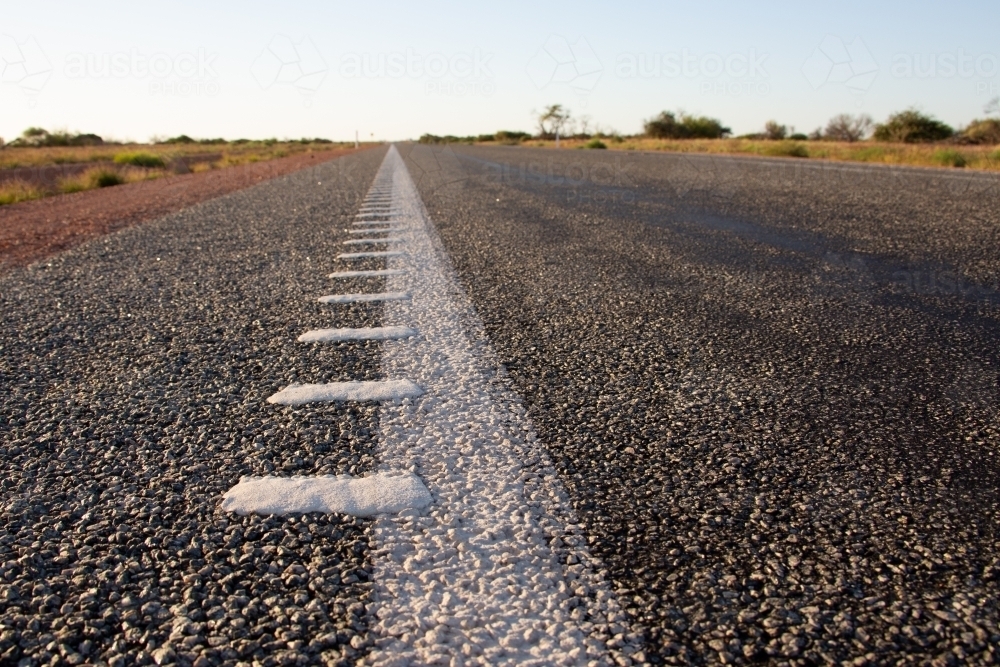 Image of Rumble strip on the side of an outback highway - Austockphoto
