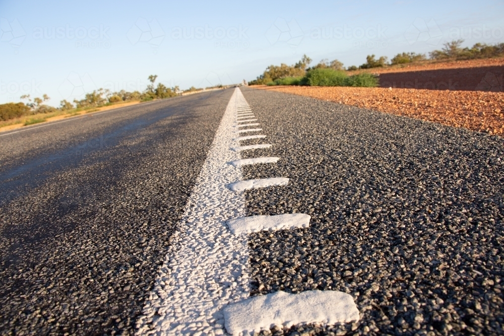 Image of Rumble strip on the side of an outback highway - Austockphoto