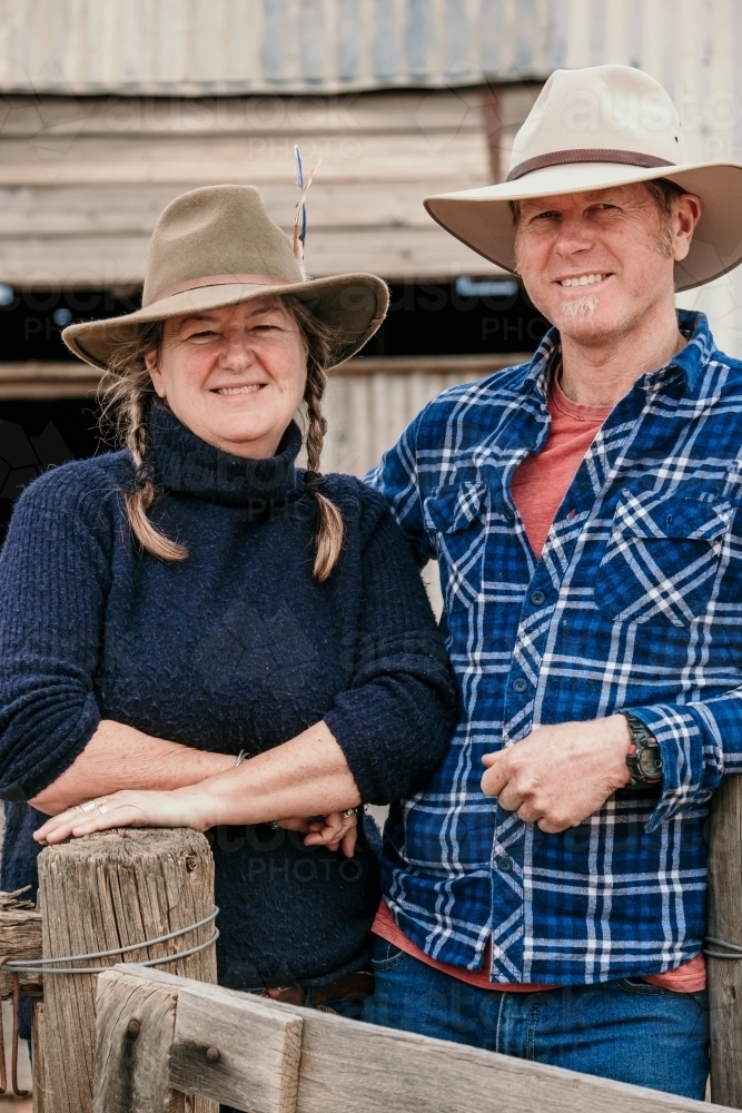 Image of Rural couple in their fifties smiling - Austockphoto