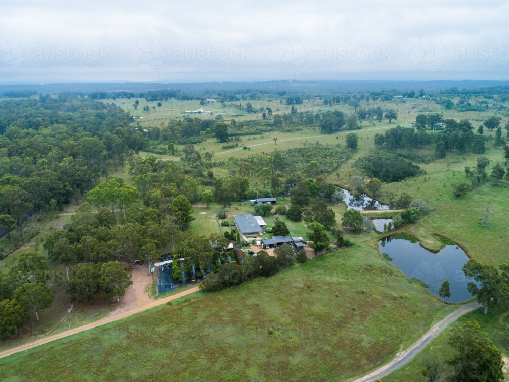 Image of rural property aerial landscape with farmhouse and small ...