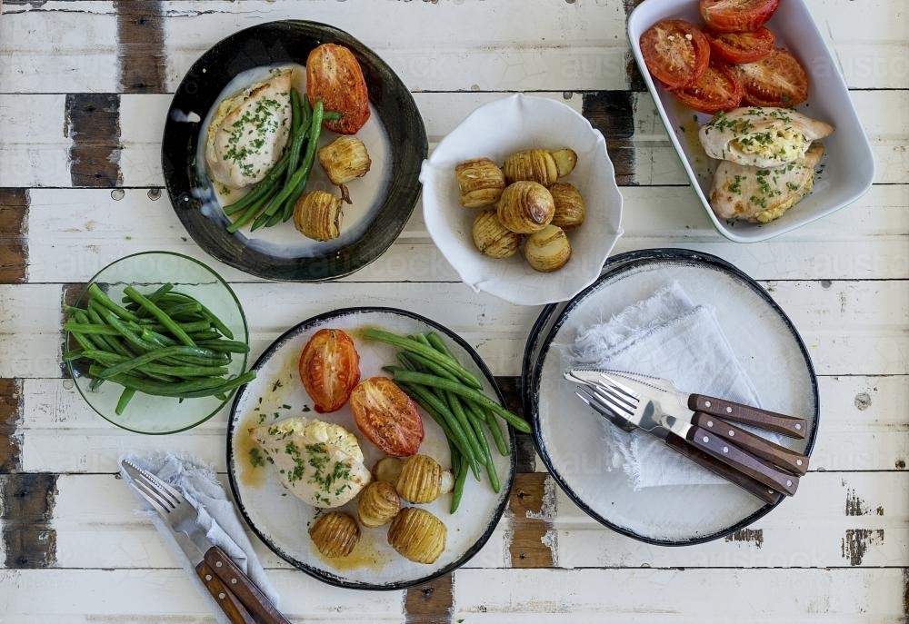 Image of Rustic roasted chicken dish viewed from above - Austockphoto
