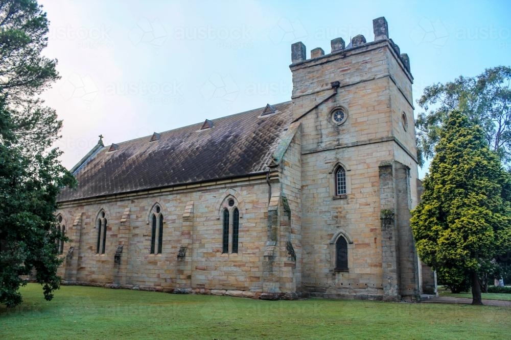 Image of Sandstone church in country town - Austockphoto