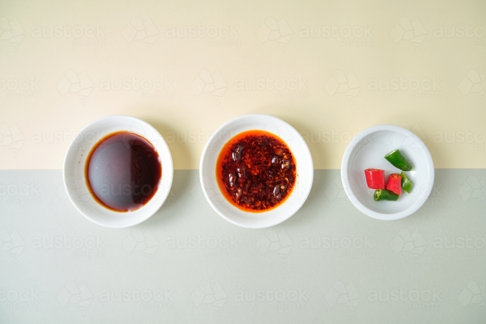 Image of Sauces on saucers - Austockphoto