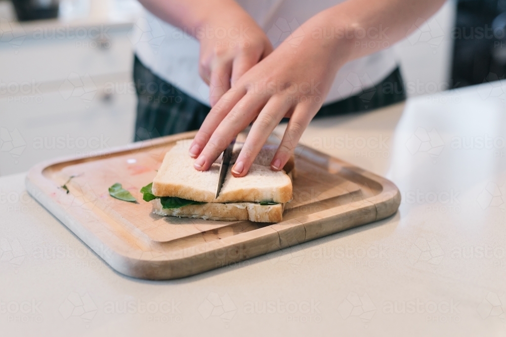 Image of school routine, making lunches - Austockphoto