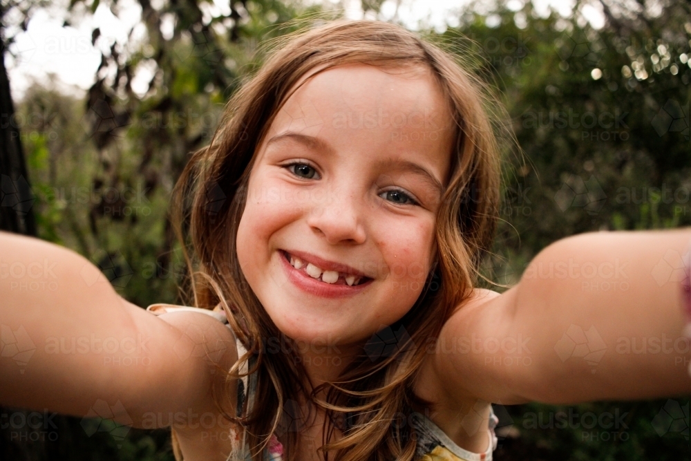 Image of Selfie of a happy girl smiling - Austockphoto