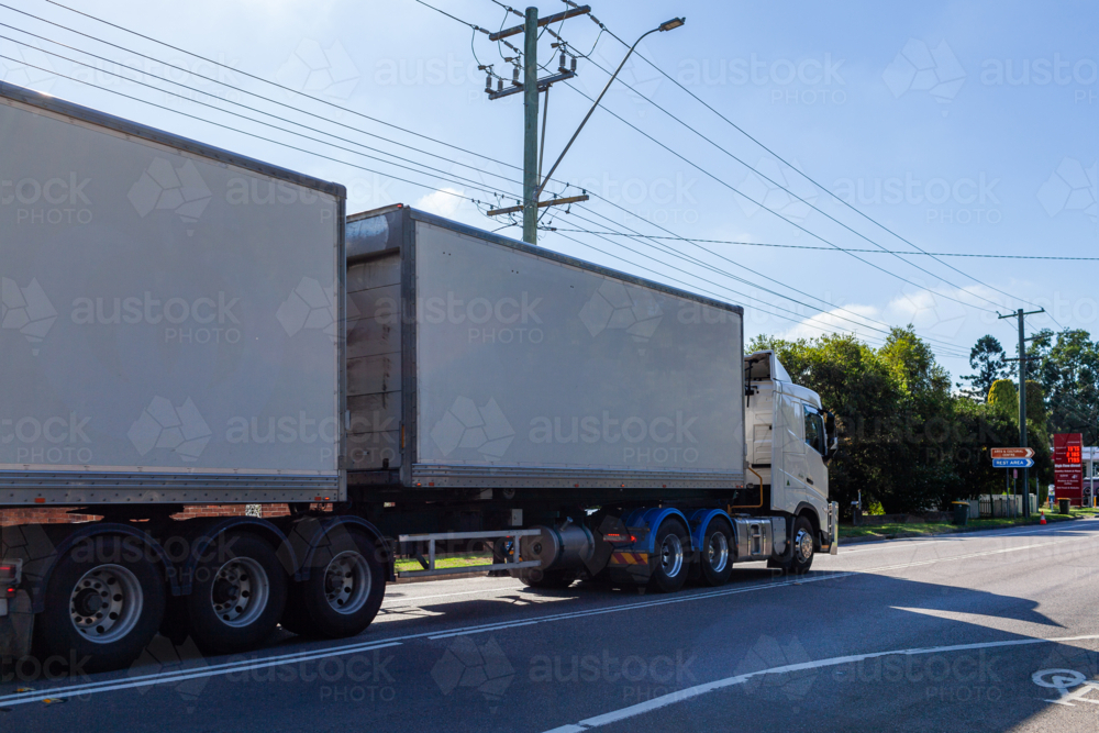 Image of Semi-trailer truck vehicle traveling along highway through ...