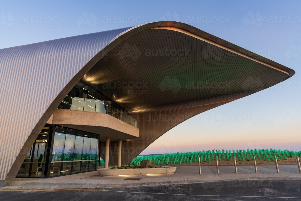 Image of Side on elevation of a modern steel transit terminal with wide ...