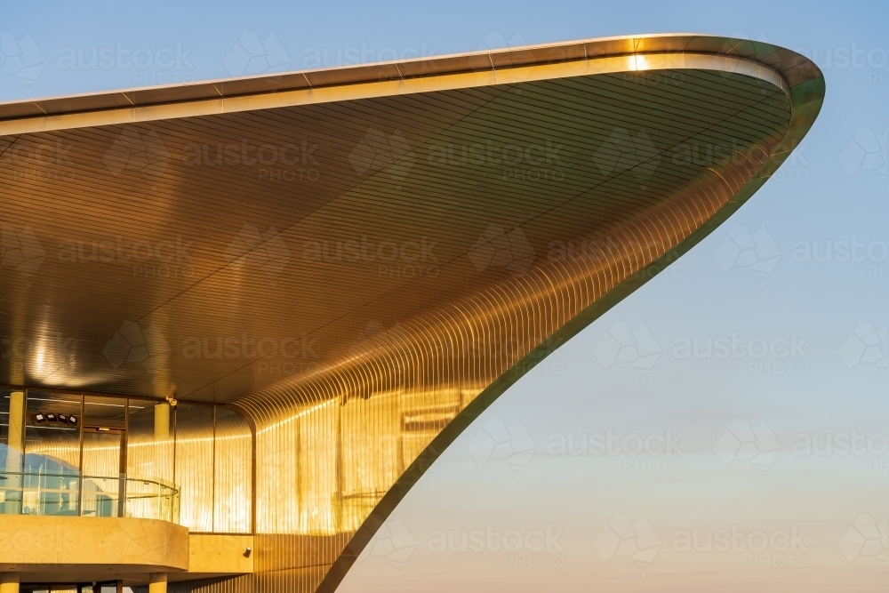 Image of Side on elevation of a modern steel transit terminal with wide ...