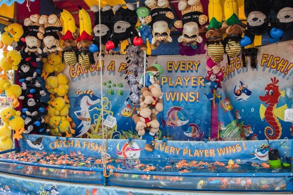 Image of Sideshow alley child fishing game at local show - Austockphoto