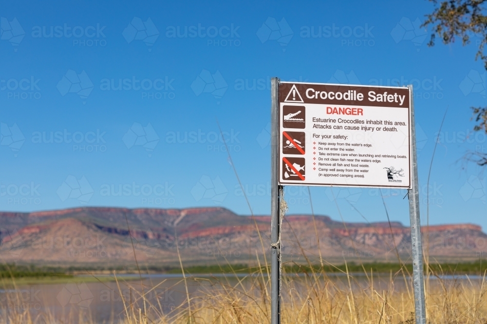 Image of sign detailing crocodile safety in the Kimberley - Austockphoto