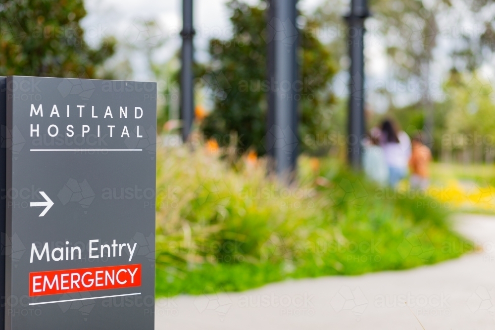 Image of sign with arrow directions to main entry of Maitland hospital ...