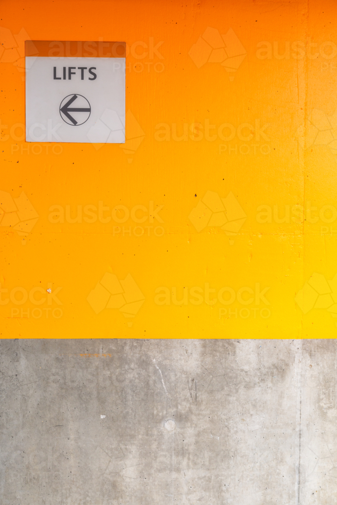 Image of Signage for lifts in a commercial car park - Austockphoto