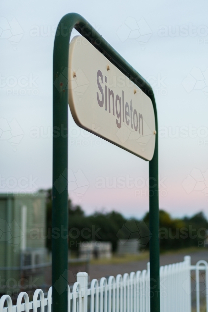 Image of Singleton train station sign in dawn light at early commute ...