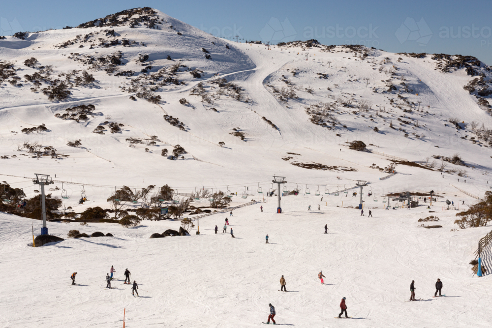 Image of Skiers in a snowy landscape at Perisher, Snowy Mountains ...