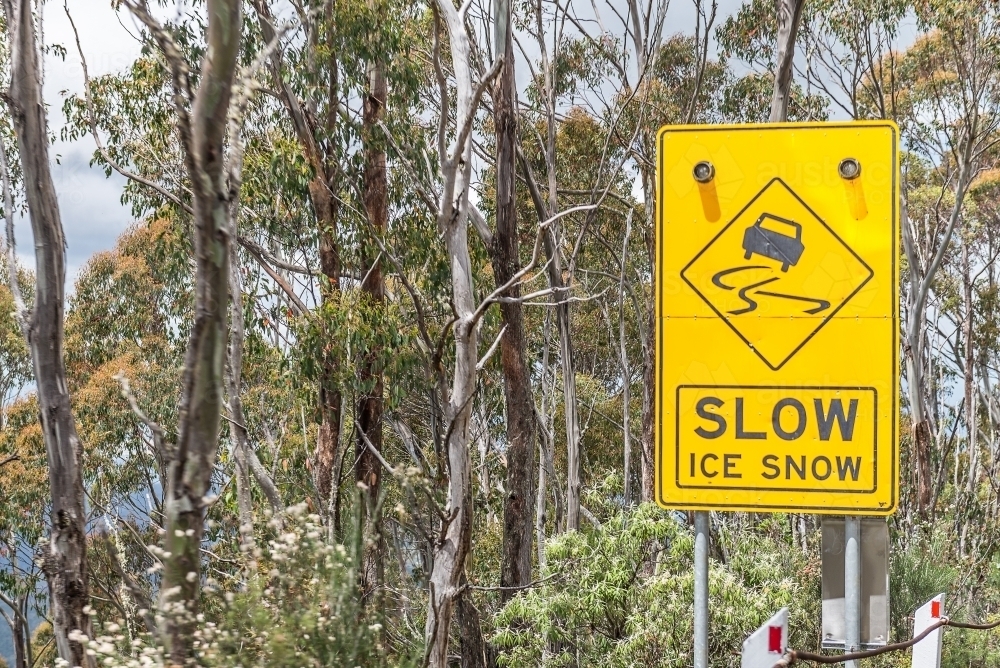 Image of Slow Ice Snow roadsign - Austockphoto