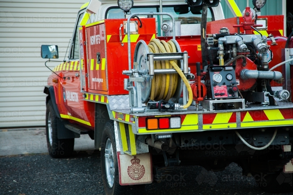 Image of Small country fire truck parked at rural fire station ready ...