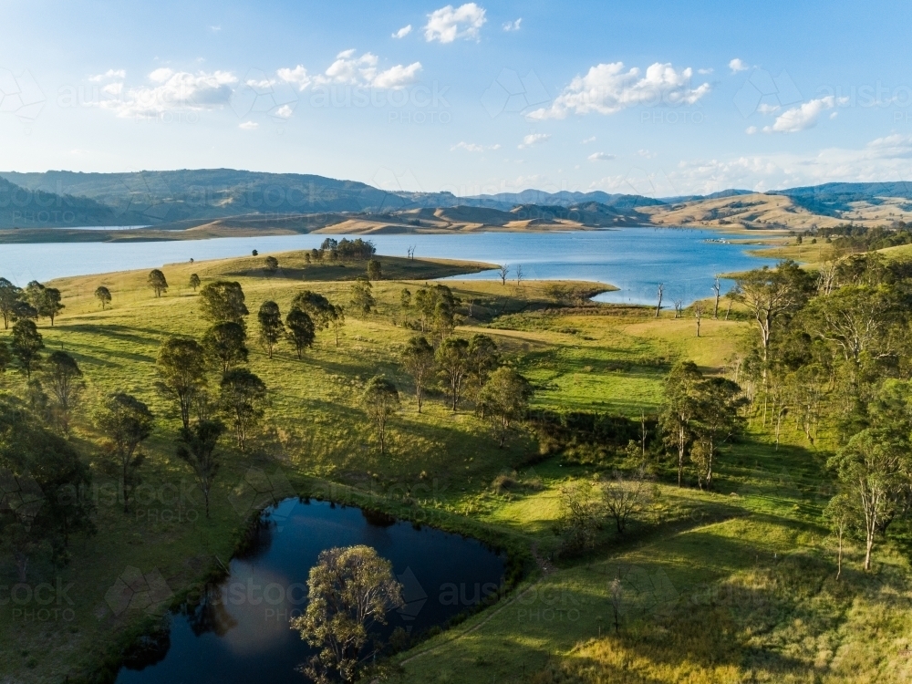 Image of Small farm dam in paddock beside Lake St Clair water supply ...