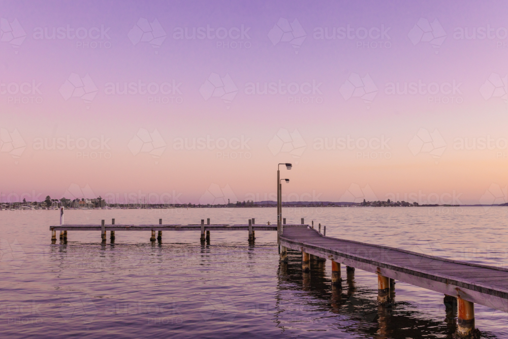 Image of Small jetty on Lake Macquarie with purple sunset sky ...