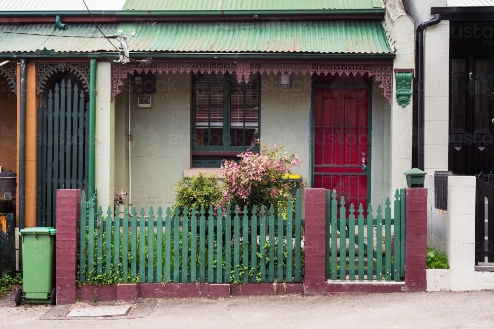 Image of small terrace house - Austockphoto