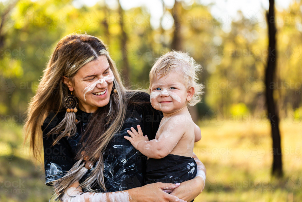 Image of Smiling aboriginal Australian baby with mother in traditional ...