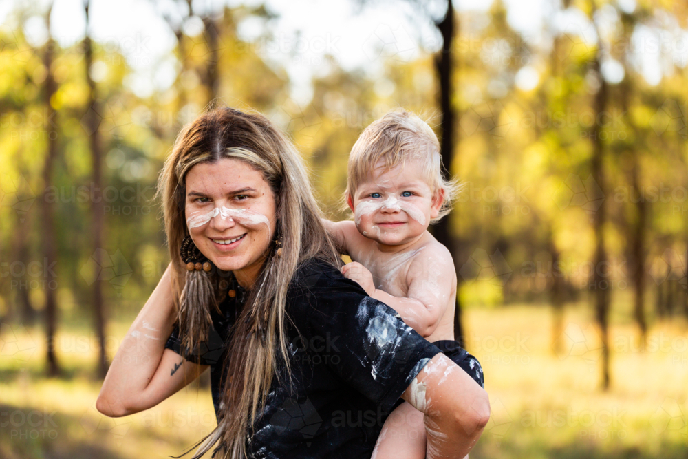 Image of Smiling aboriginal Australian baby with mother in traditional ...