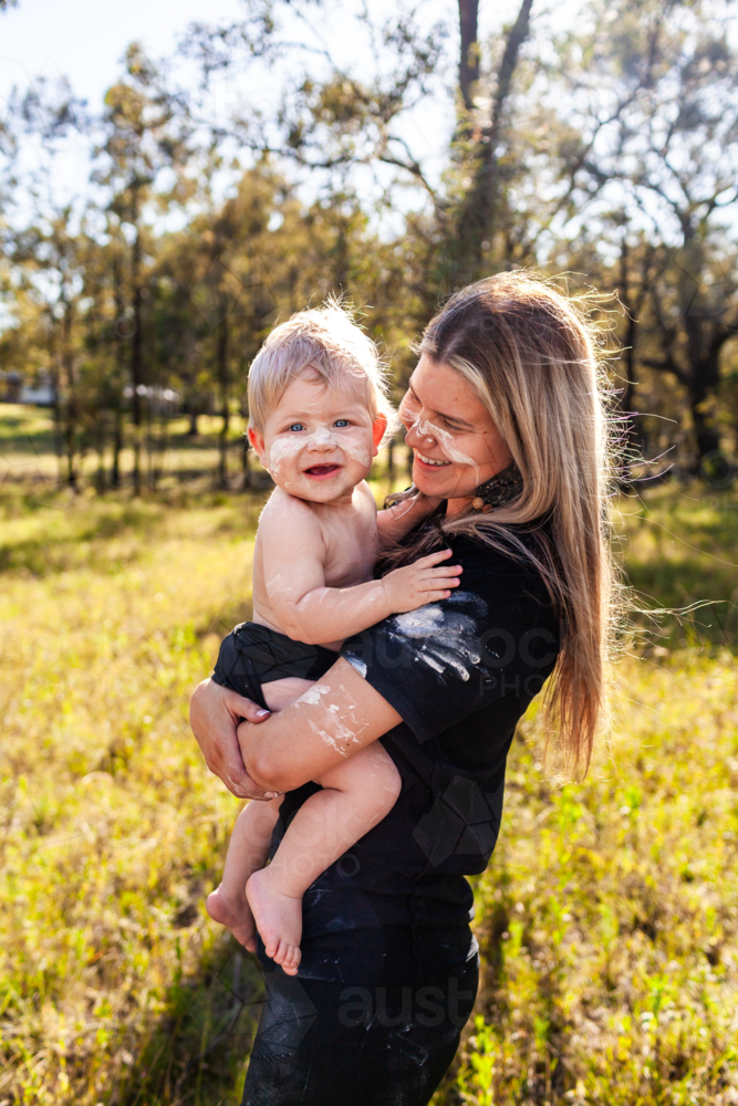 Image of Smiling aboriginal Australian baby with mother in traditional ...