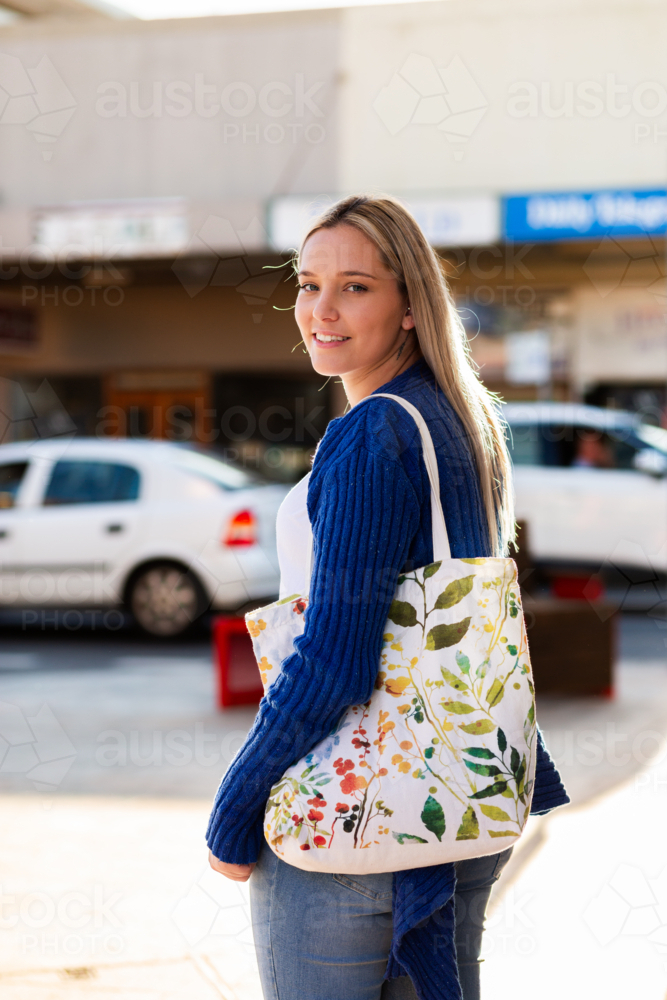 Image of Smiling portrait of Aboriginal Australian young person in town ...
