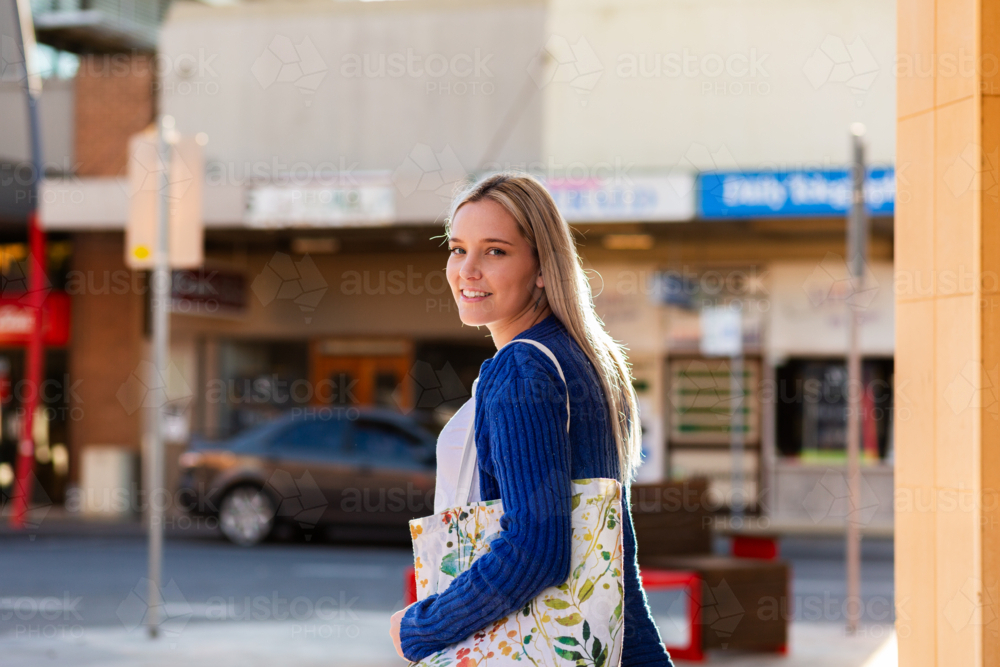 Image of Smiling portrait of Aboriginal Australian young person in town ...