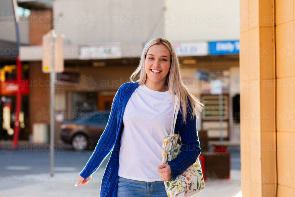 Image of Smiling portrait of Aboriginal Australian young person in town ...