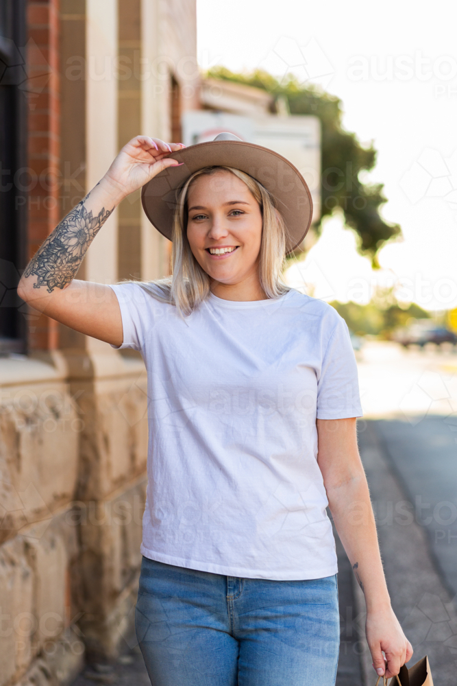 Image of Smiling portrait of Aboriginal Australian young person in town ...
