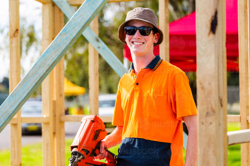 Image of smiling portrait of young Aussie trade apprentice bloke with ...