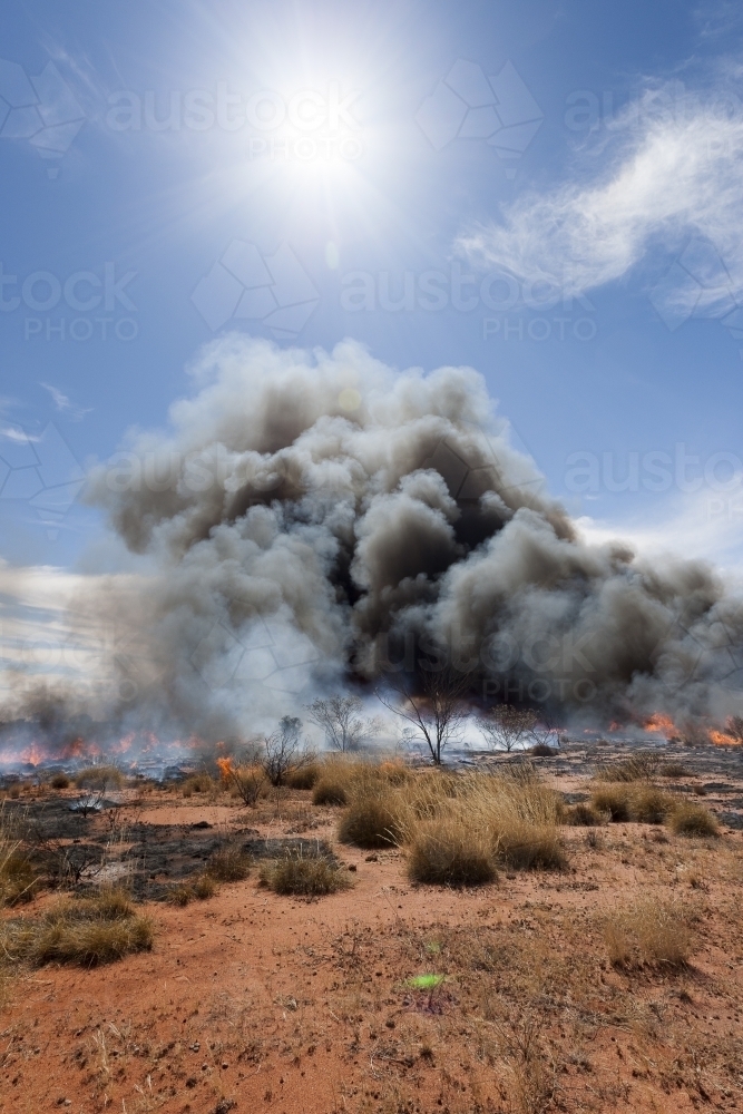 Image of Smoke of desert fire in the outback - Austockphoto