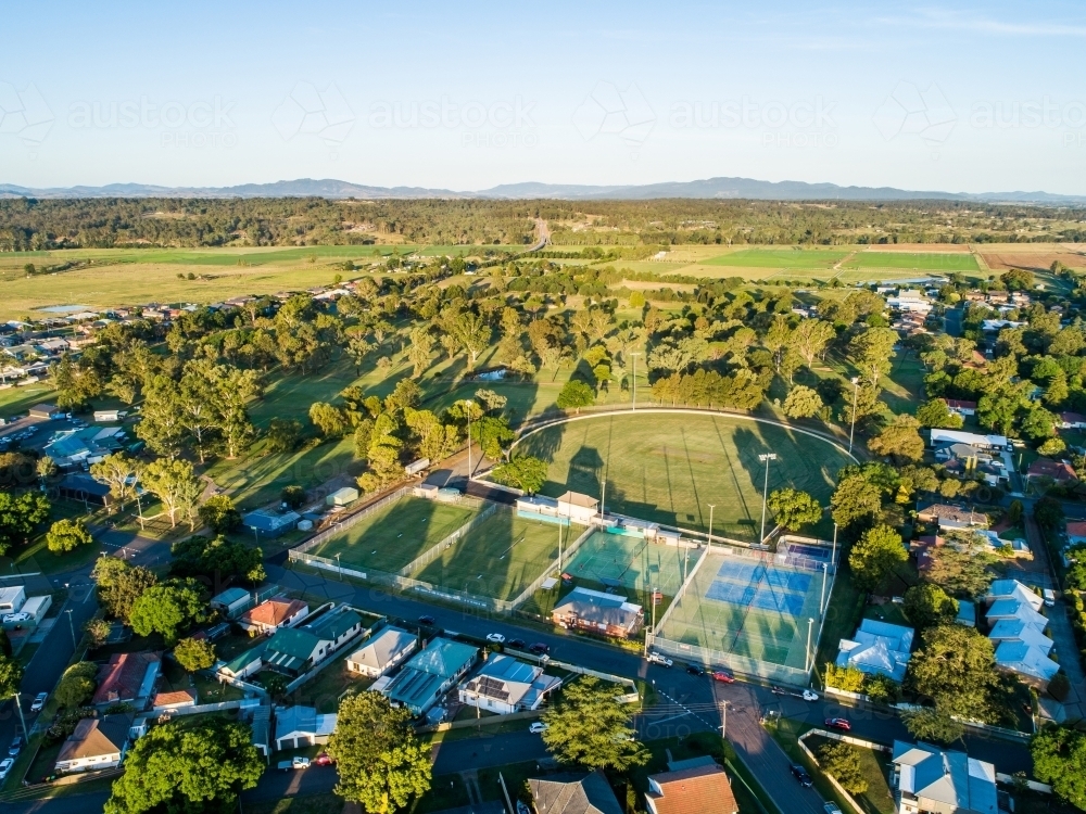 Image of Sports ground, tennis club and football oval beside golf ...