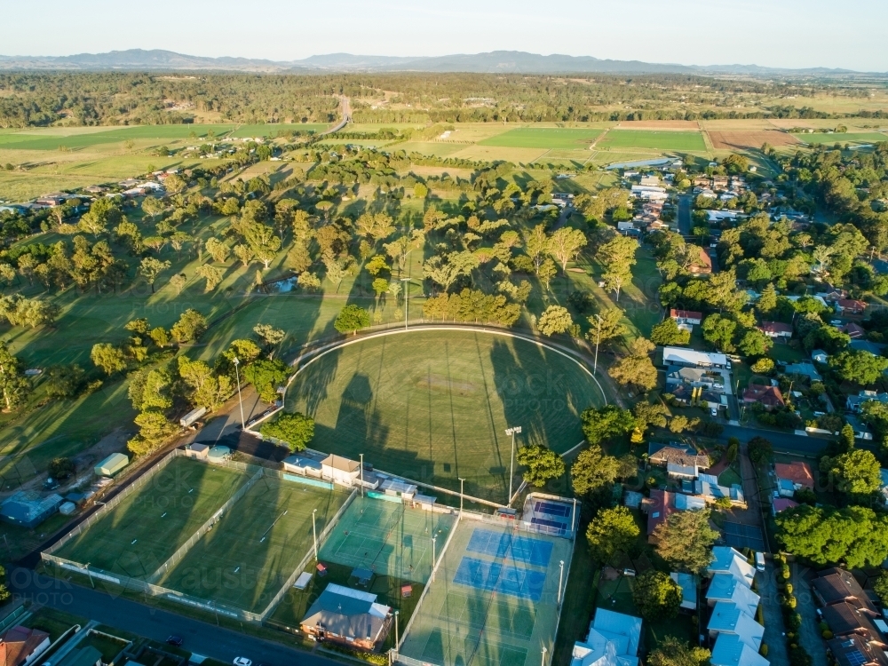 Image of Sports ground, tennis club and football oval beside golf ...