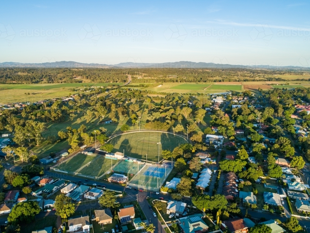 Image of Sports ground, tennis club and football oval beside golf ...