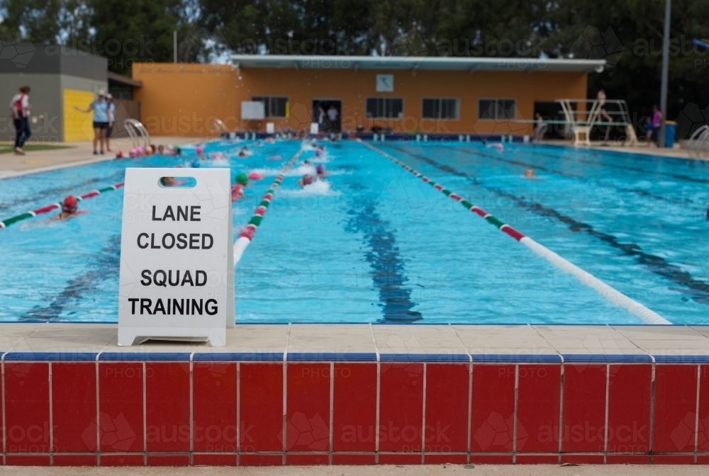 Image of squad training sign at a swimming pool - Austockphoto