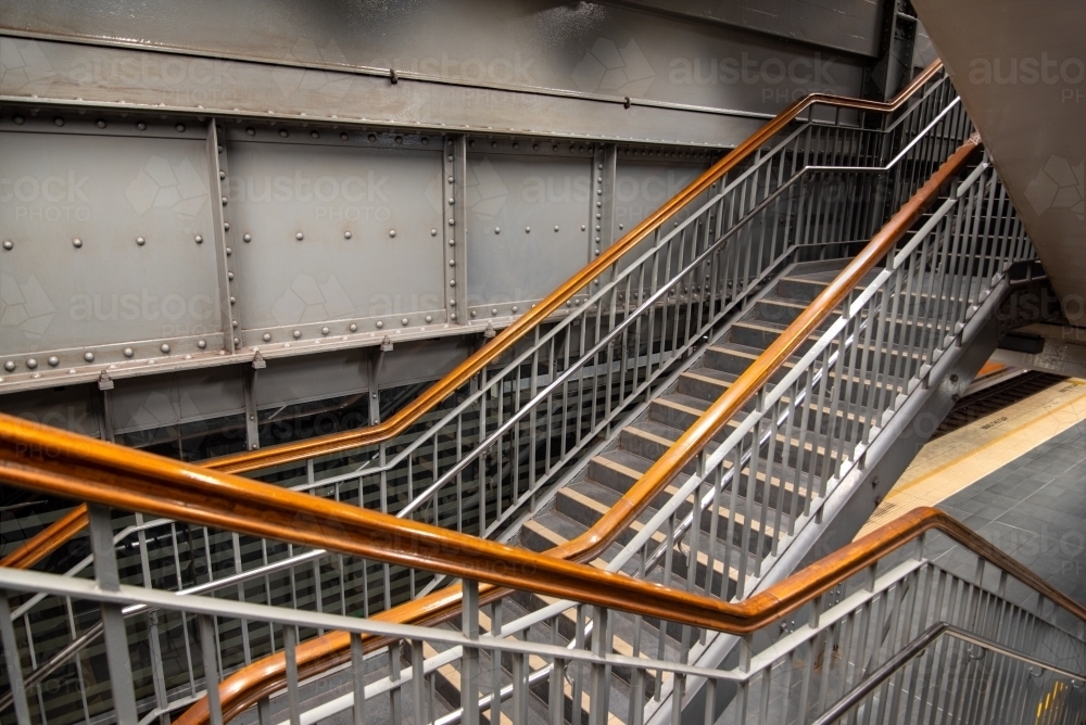 Image of Stairs with wooden handrails in the underground train system ...