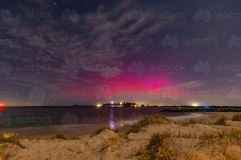 Image of Starry night sky over Yamba NSW with vibrant pink and purple ...
