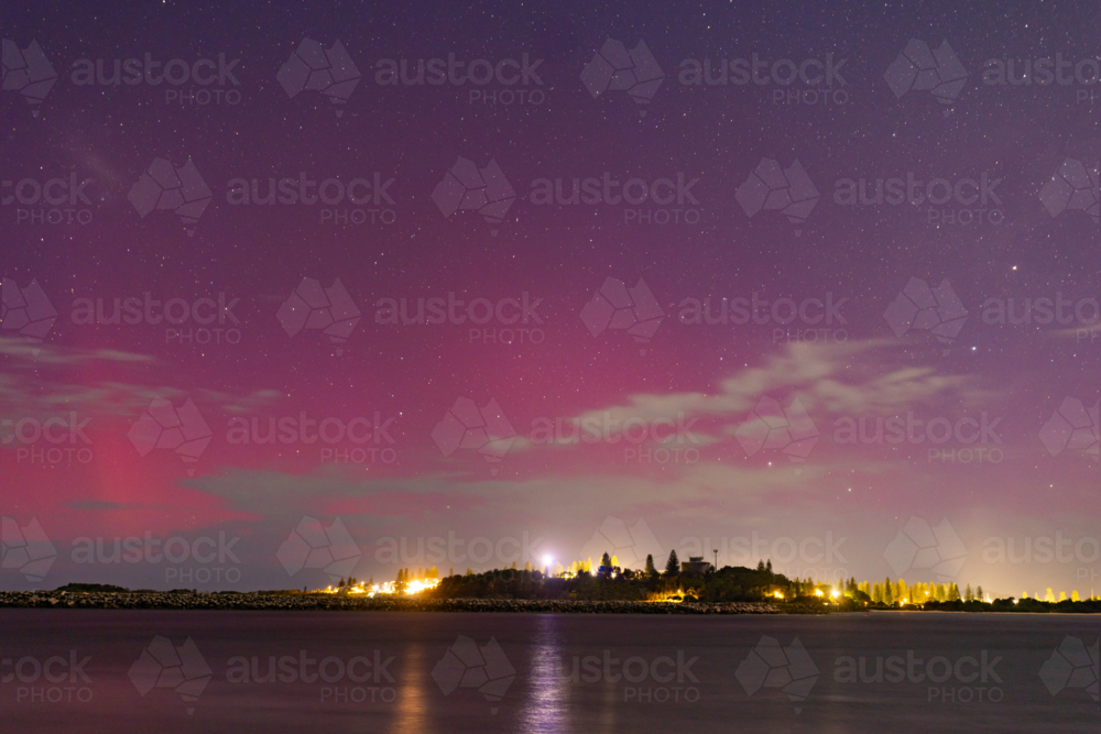 Image of Starry night sky over Yamba NSW with vibrant pink and purple ...