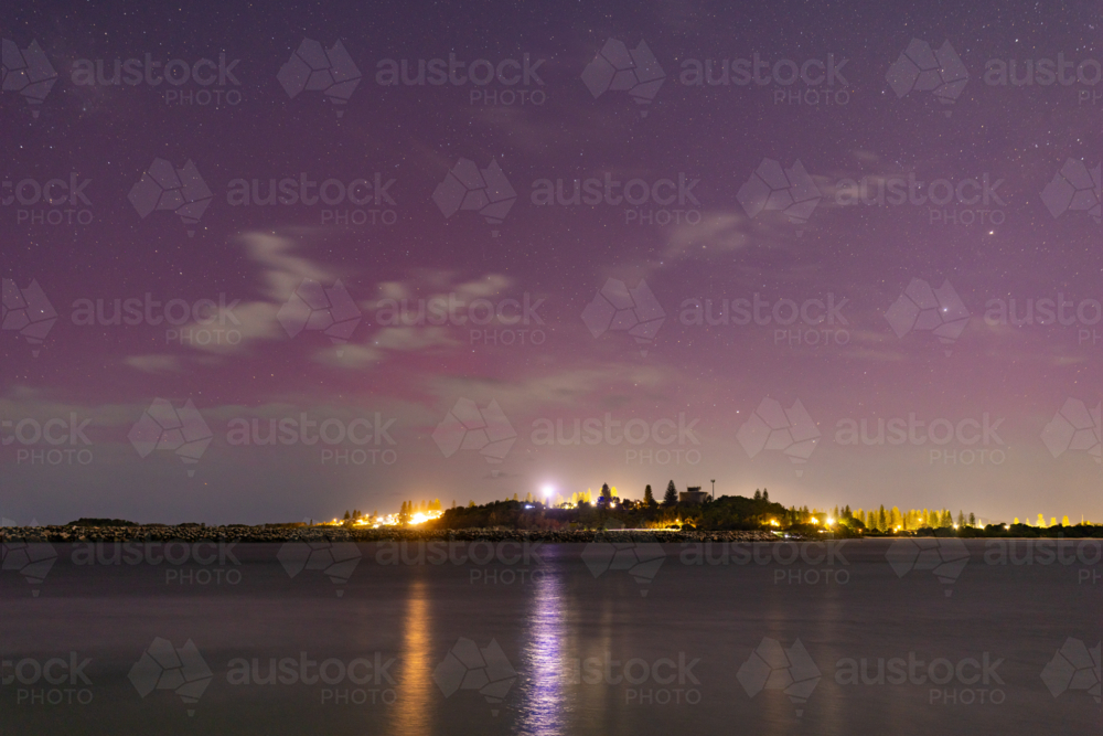 Image of Starry night sky over Yamba NSW with vibrant pink and purple ...