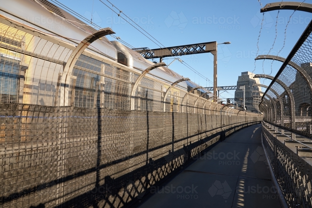 Image of Steel made security fence around the train railway - Austockphoto
