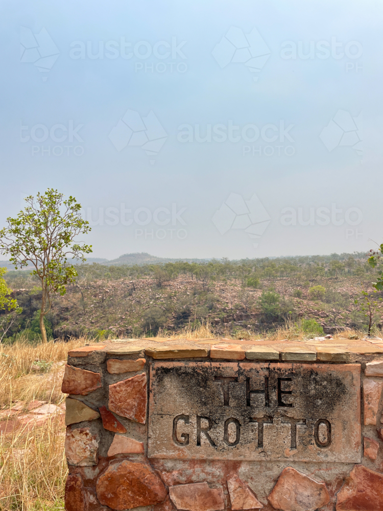 Image of Stone sign ‘The Grotto’ a waterhole tourist destination with ...