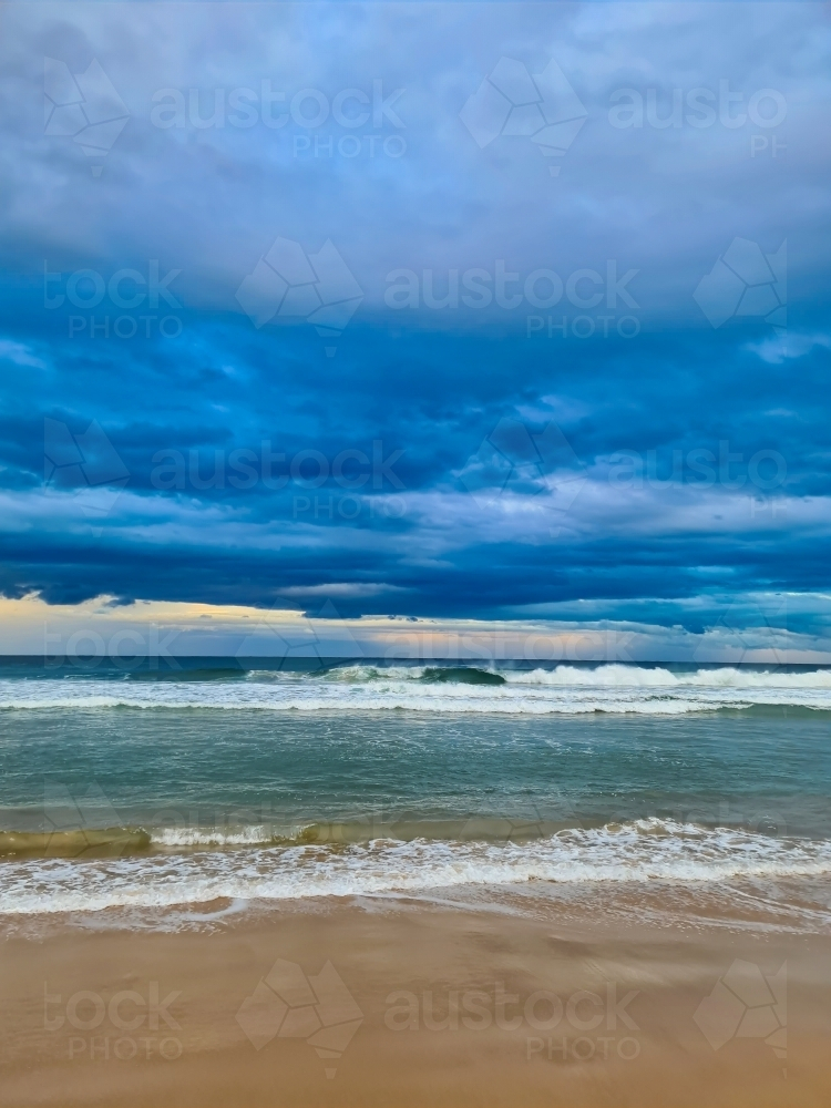 Image of Storm clouds forming over the beach at Norah Head on the NSW ...