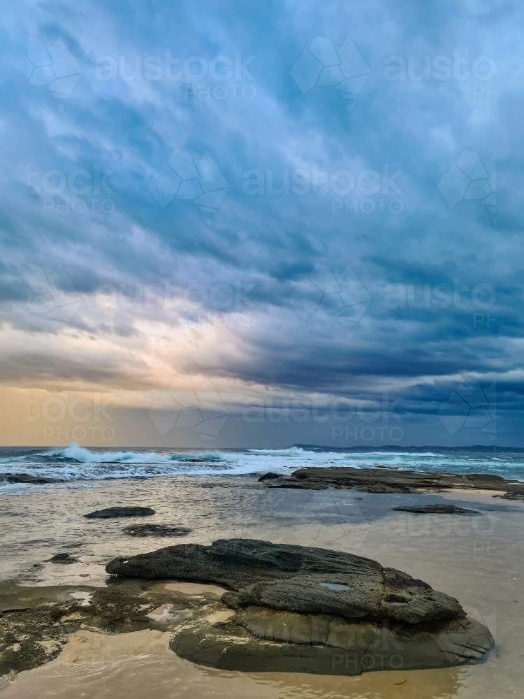Image of Storm clouds forming over the beach at Norah Head on the NSW ...