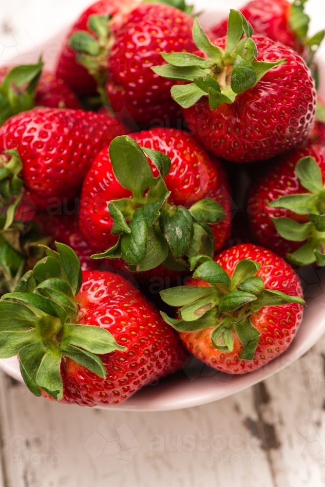 Image of strawberries in a bowl - Austockphoto