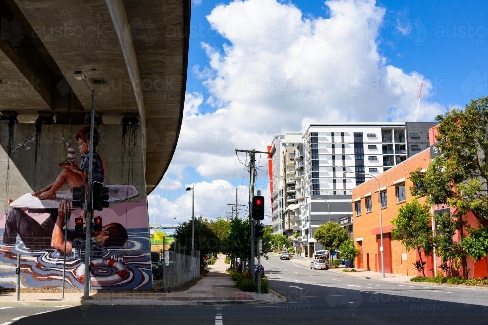Image of Street art under an overpass beside intersection - Austockphoto